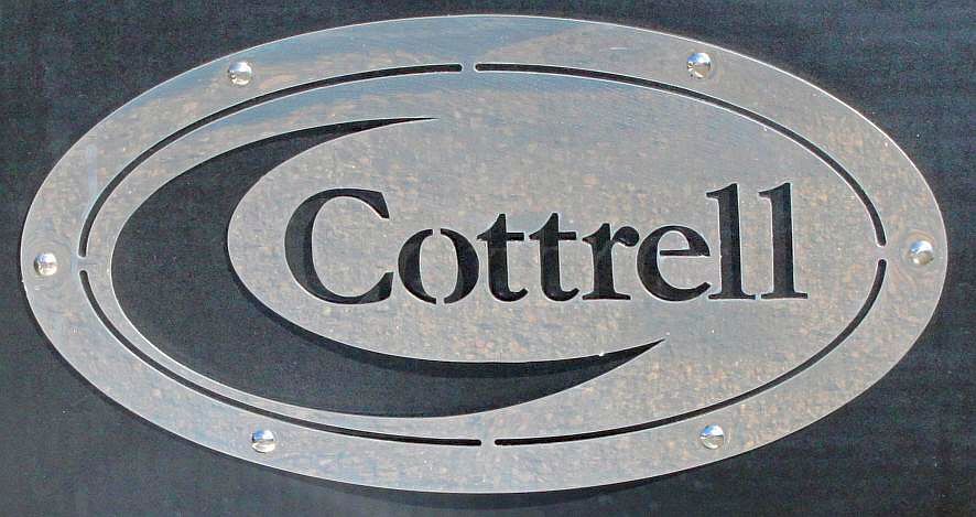 COTTRELL STAINLESS MUDFLAP LOGO - Cottrell Trailers
